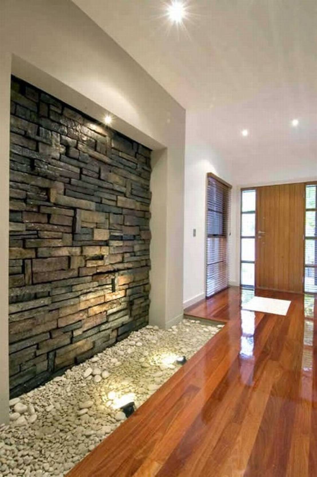 15 Artistic Stacked Stone Wall to Catch Your Attention